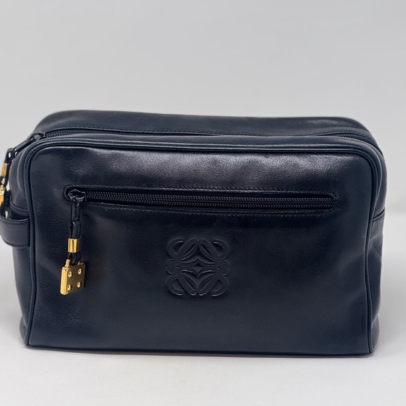 Loewe | Bags | Authentic Loewe Leather Clutch | Poshmark